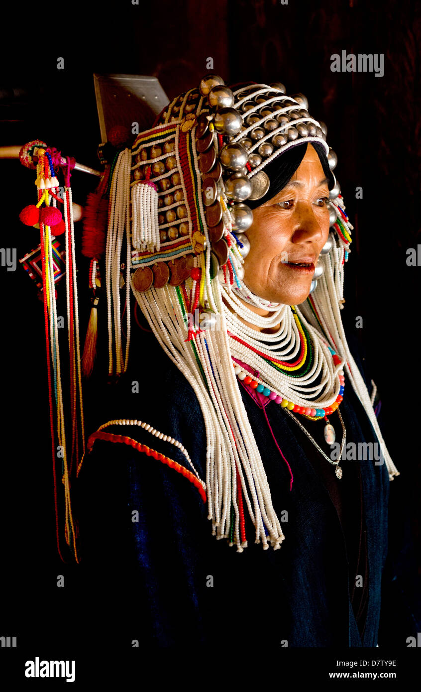 Woman of the Akha tribe in traditional dress, in a hill village near ...