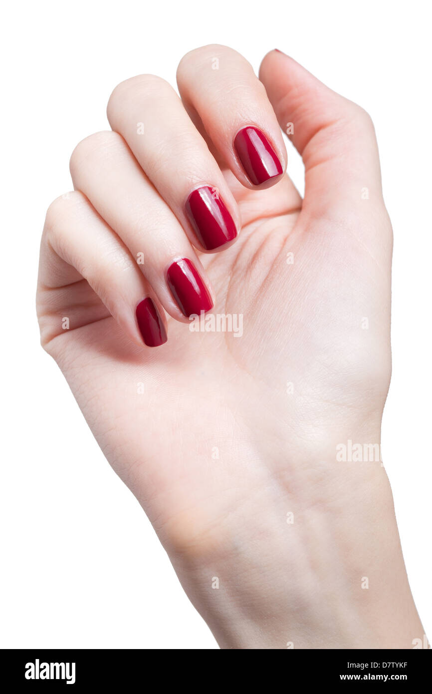 hands with woman's professional red nails manicure isolated on white ...