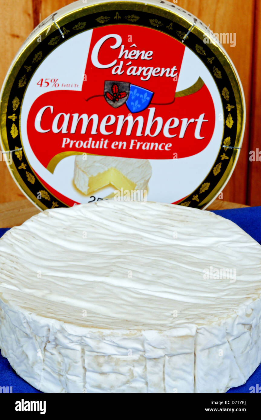 Whole French Camembert with a round wooden box Stock Photo - Alamy