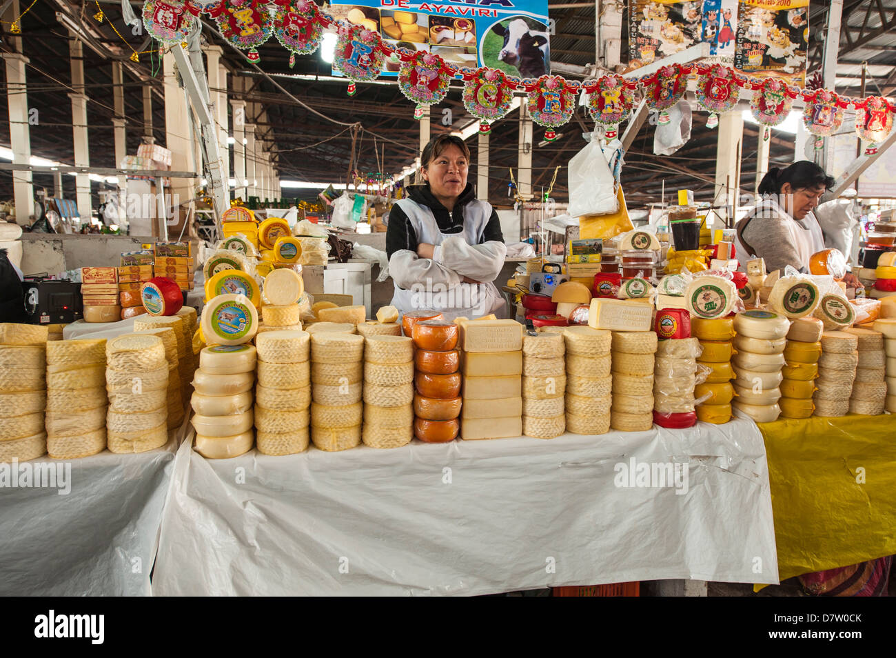 Cheese vendor in local market, Cuzco, Peru, South America Stock Photo ...