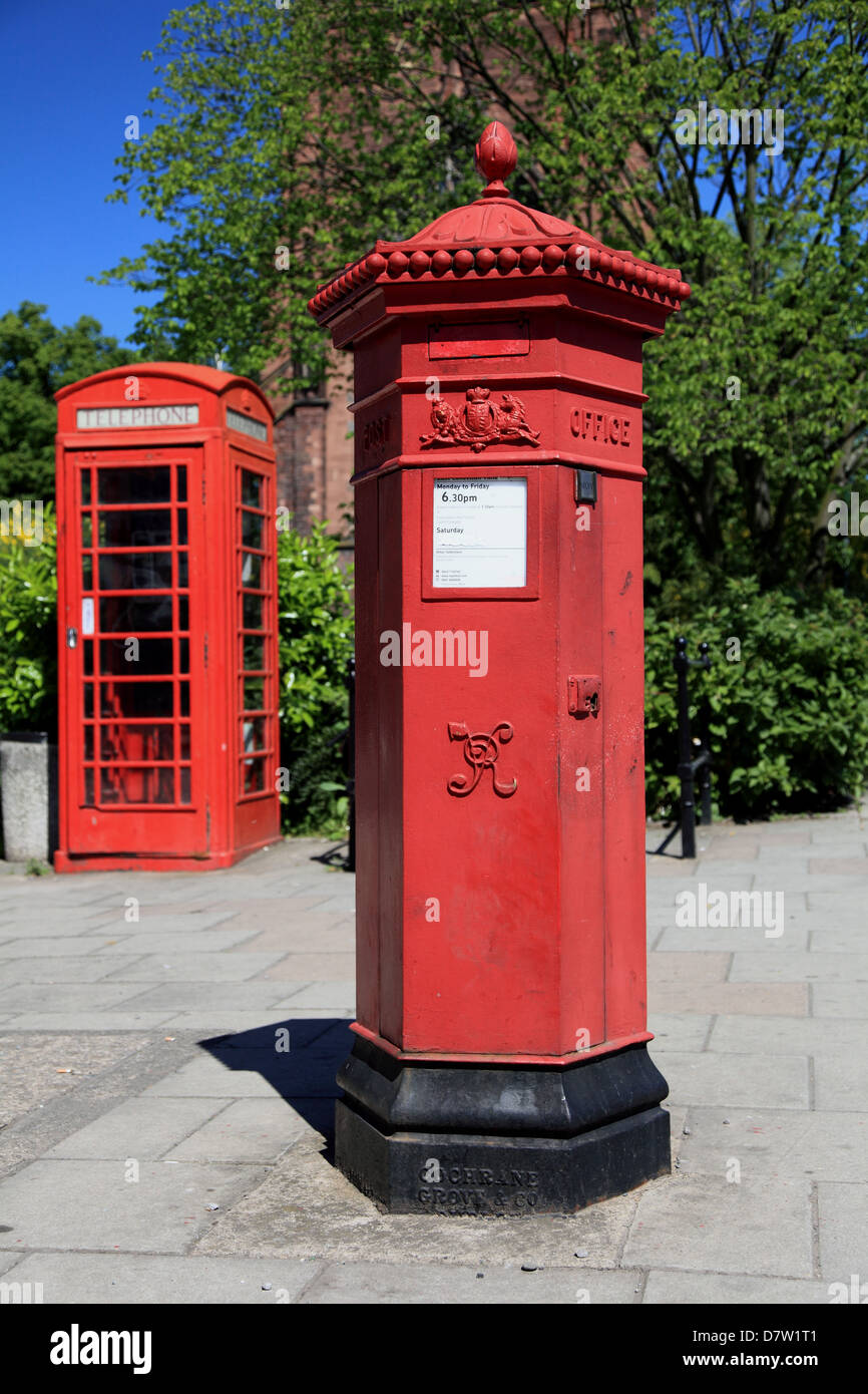Red Victorian pillar box with red Giles Gilbert Scott telephone kiosk ...