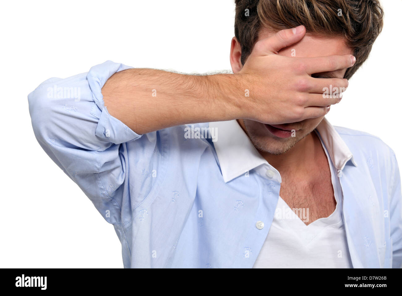 man putting his hand on his face Stock Photo - Alamy