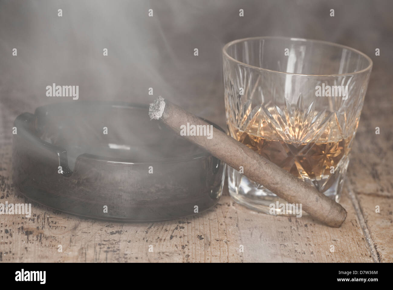 Whiskey and cigar on a wooden table Stock Photo - Alamy