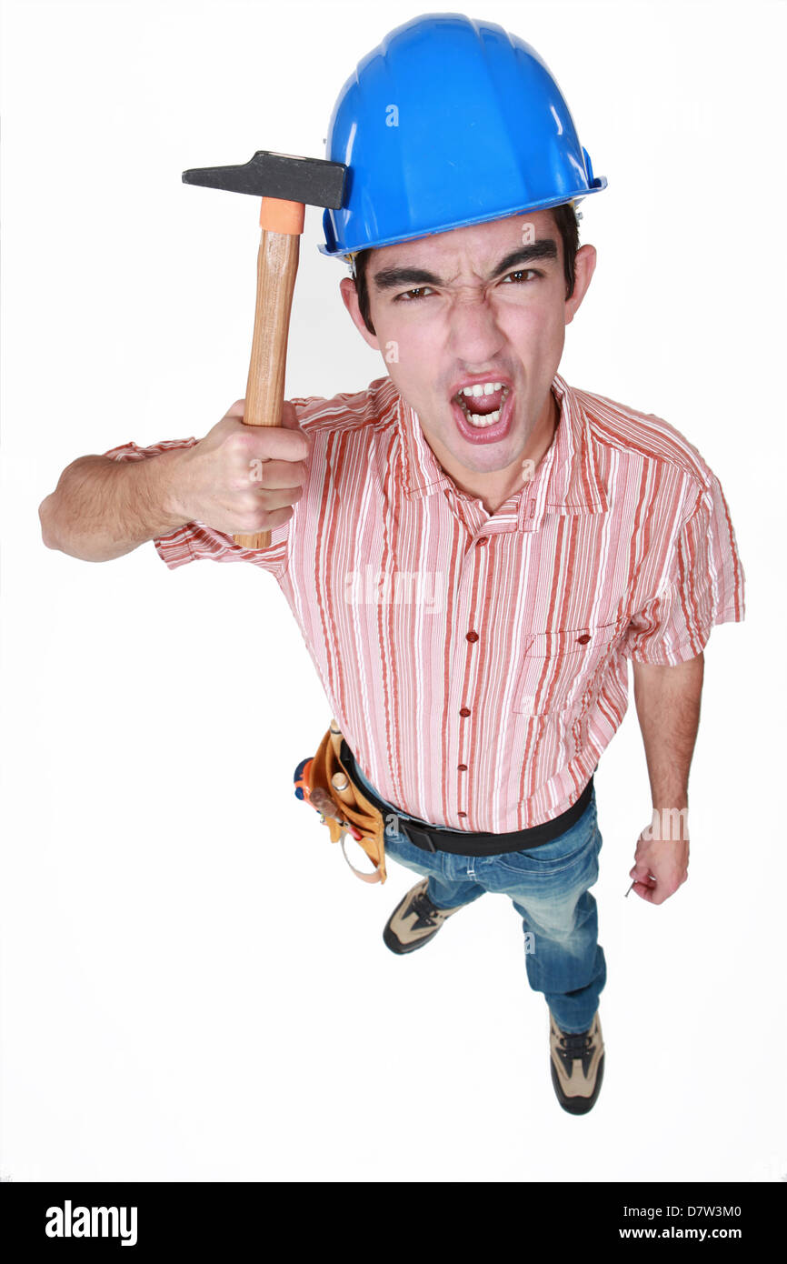 Construction worker hitting his head with a hammer Stock Photo - Alamy