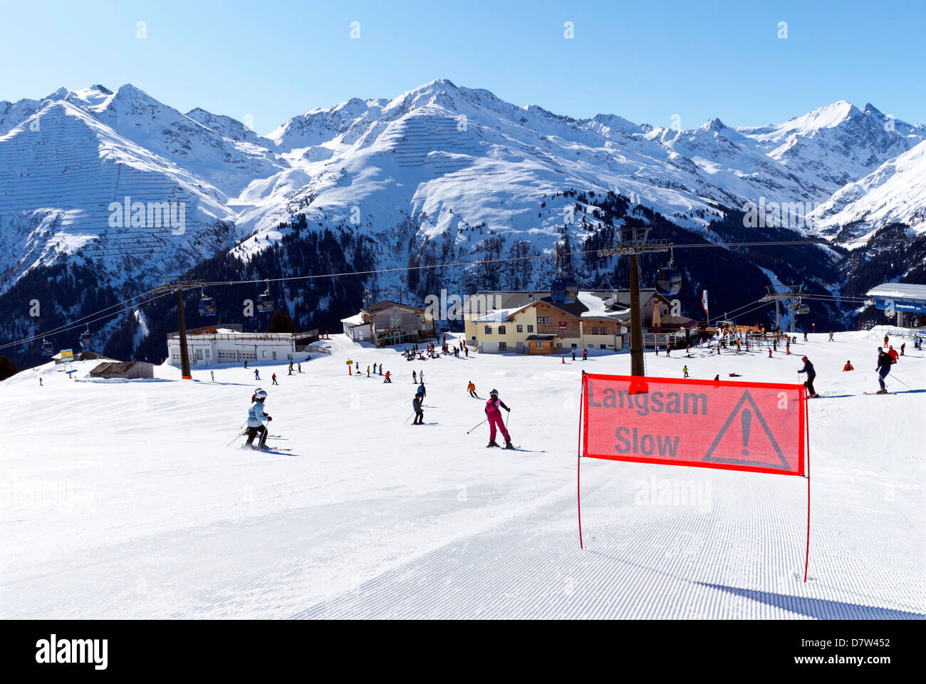 Slow down ski sign hi-res stock photography and images - Alamy