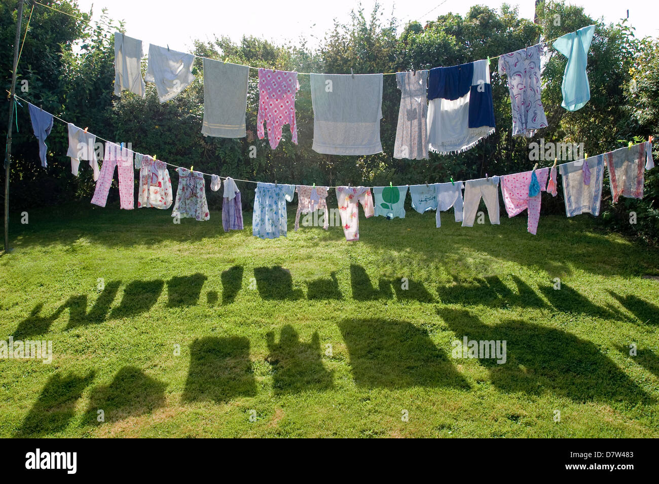 washing drying on a line Stock Photo - Alamy