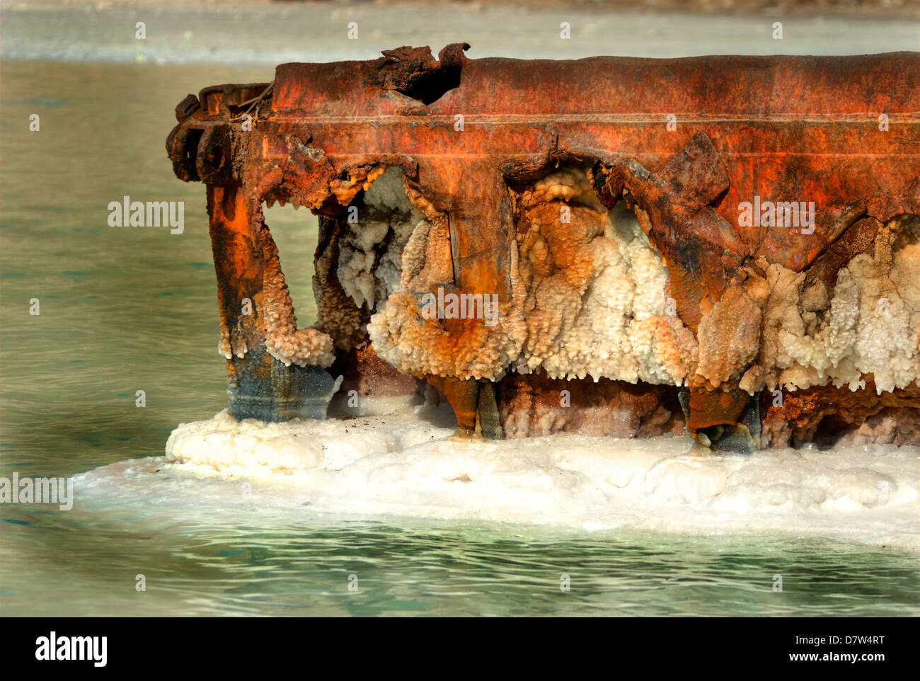 Israel, Dead Sea, salt crystalization on a metal pier caused by water ...