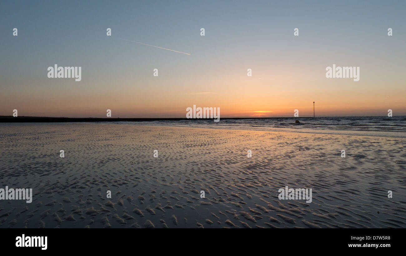 Sunset at Minnis Bay Kent England at low water Stock Photo - Alamy