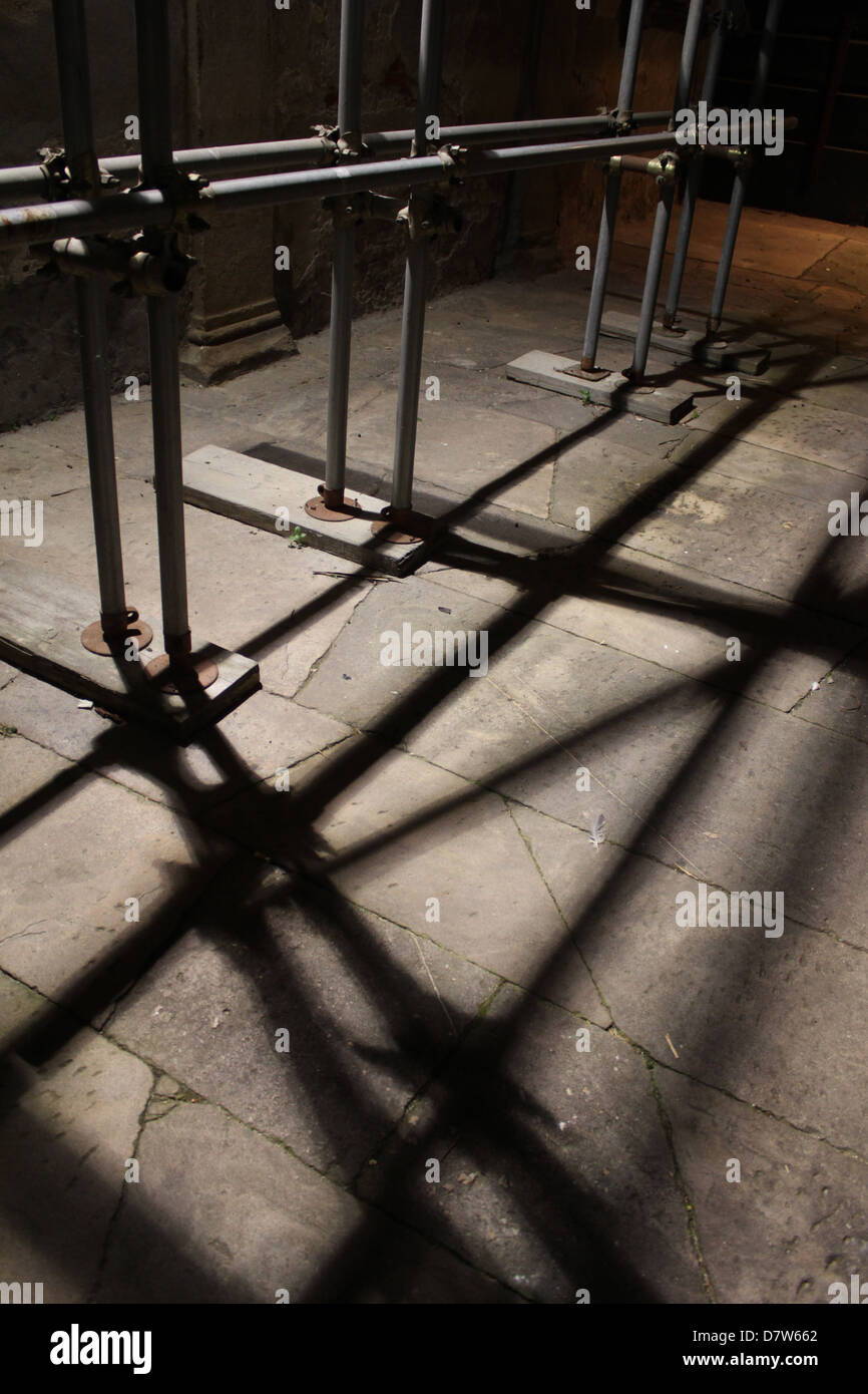 scaffolding on building at night in street road in city town Stock ...