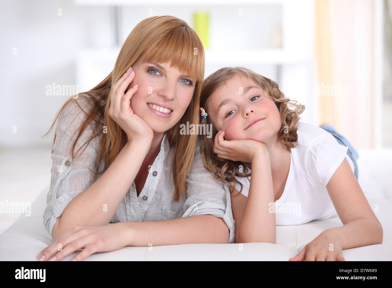Mother and daughter at home Stock Photo - Alamy