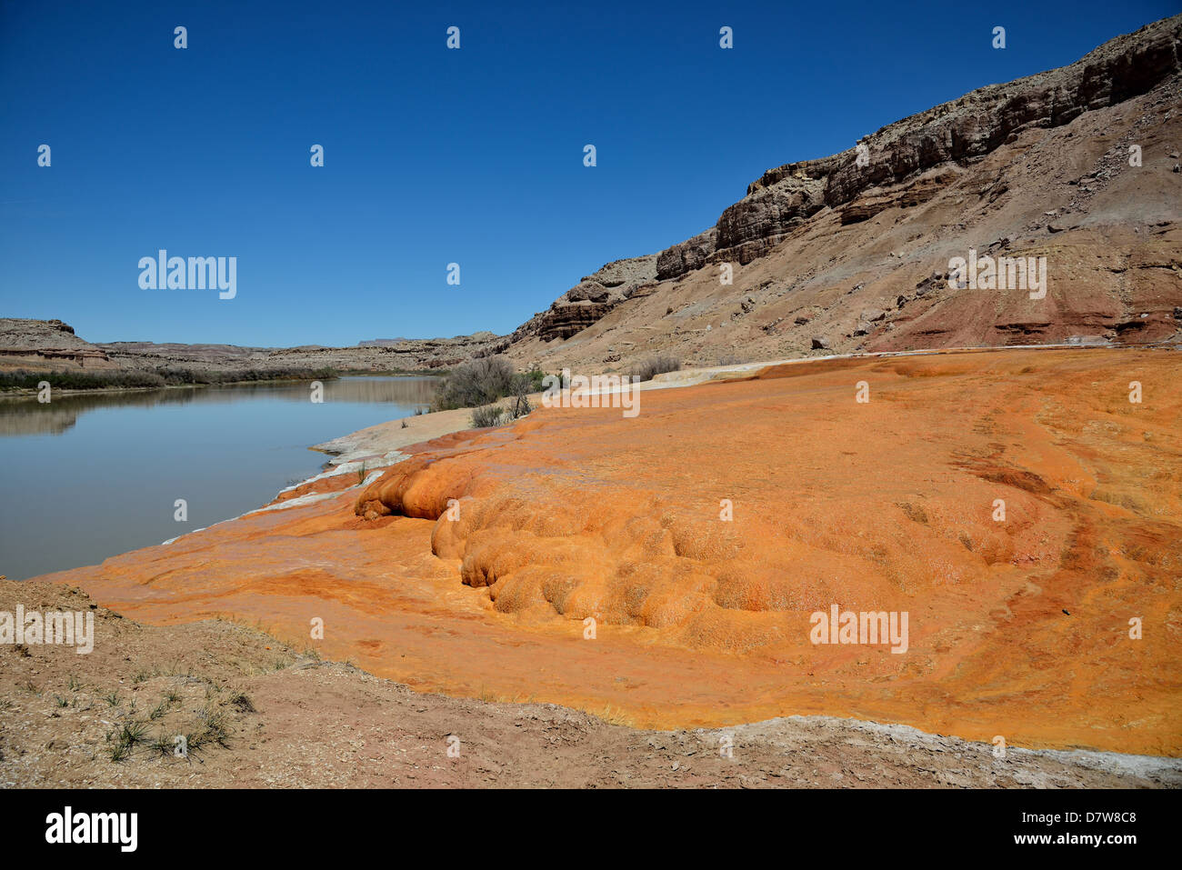 Bright orange travertine deposits at the Crystal Geyser. Green River ...