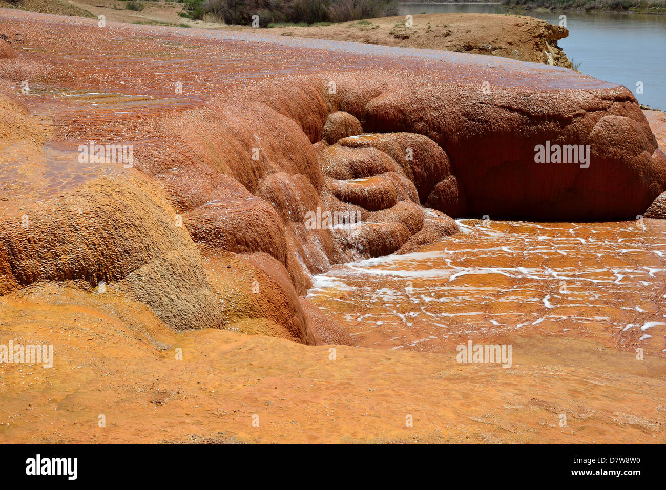 Bright orange travertine deposits at the Crystal Geyser. Green River ...