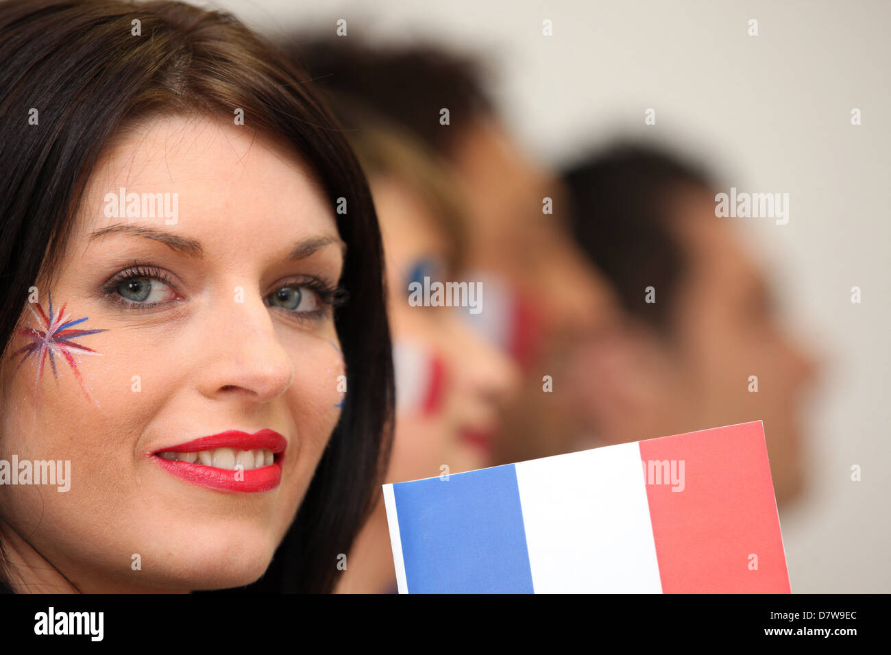 Female french soccer fan holding hi-res stock photography and images ...