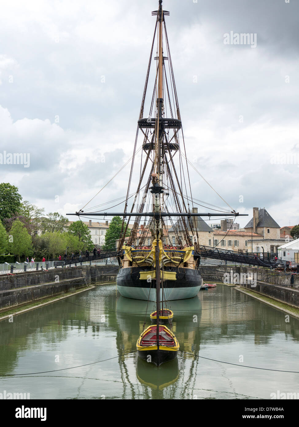 Visitors look at the replica of the 18th century French frigate ...