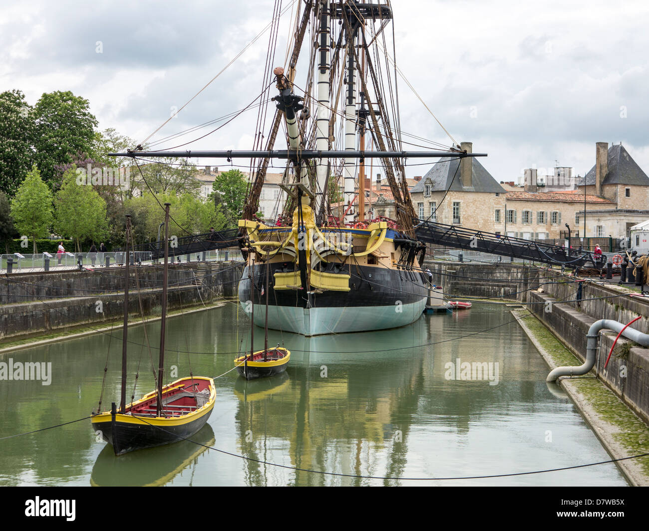 Visitors look at the replica of the 18th century French frigate ...