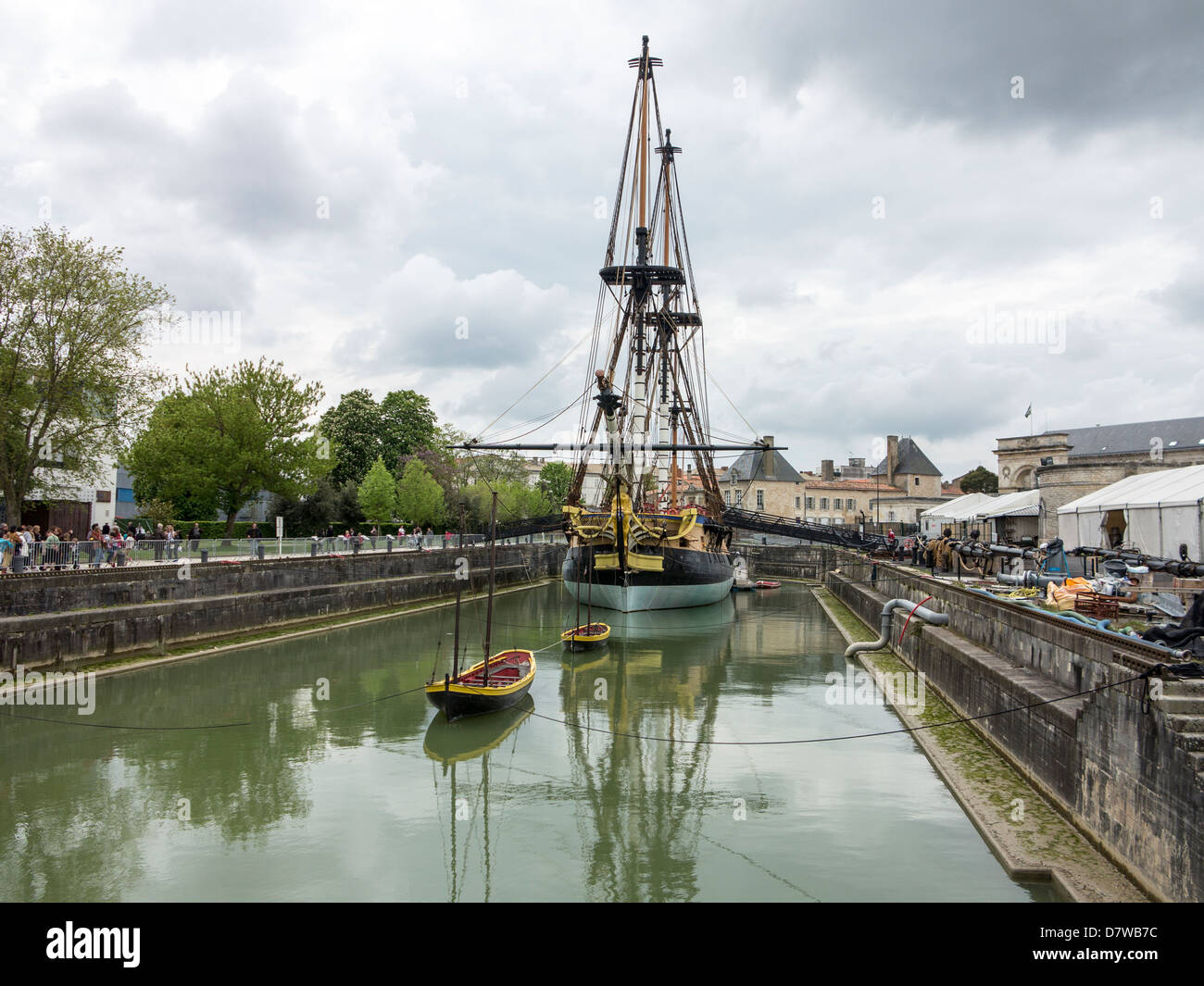 Visitors look at the replica of the 18th century French frigate ...
