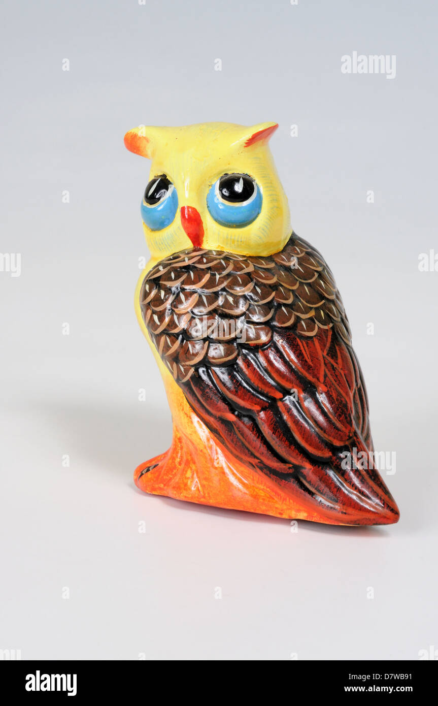 Owl looking over shoulder ornament against a white background Stock ...