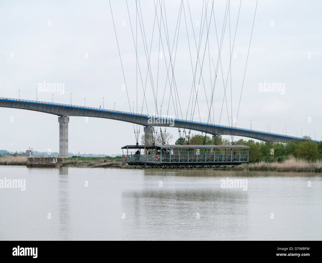 A view of the historic Transporter bridge crossing the Charente river ...
