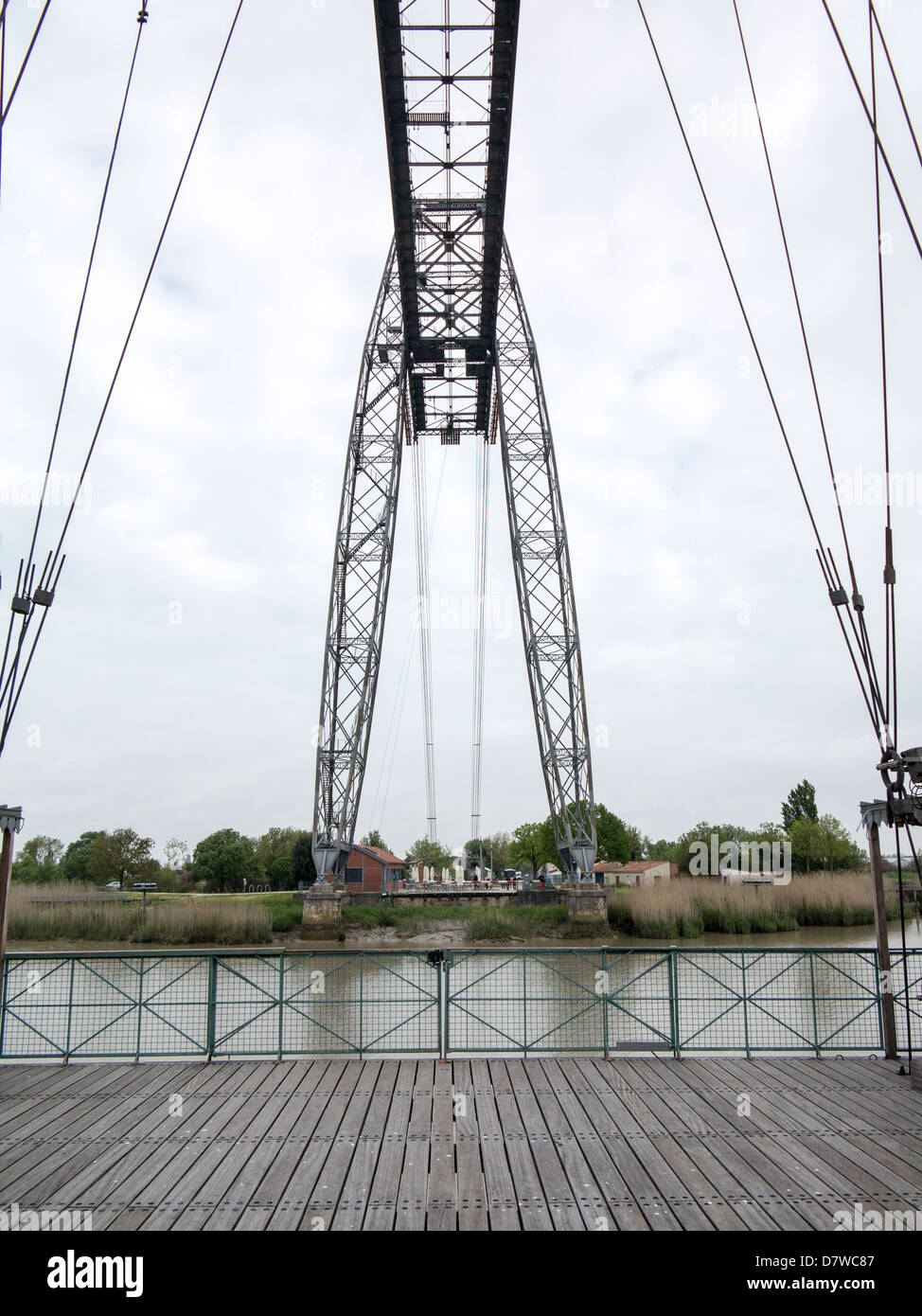 A view of the historic Transporter bridge crossing the Charente river ...