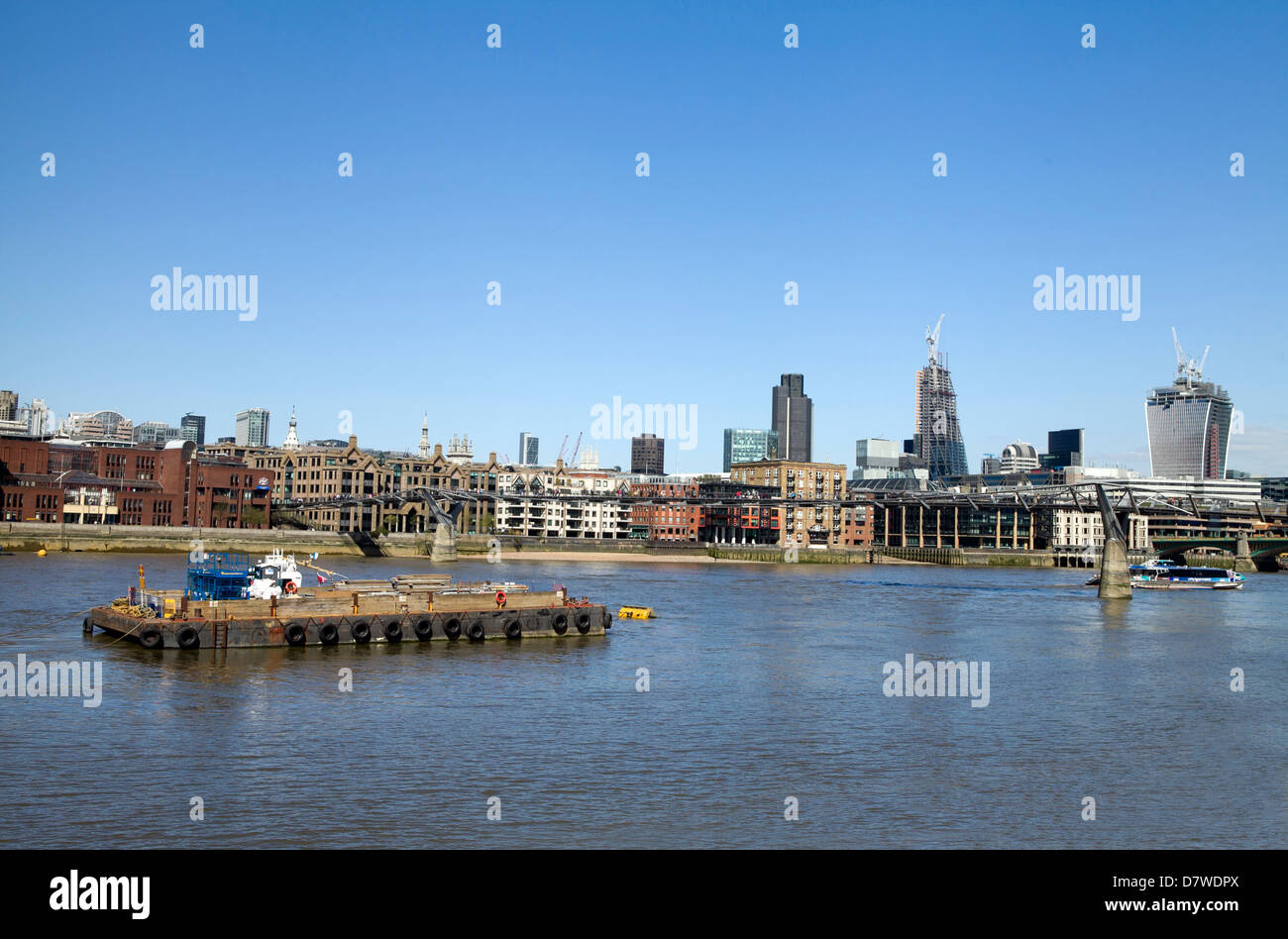 Office buildings by river in London Stock Photo - Alamy