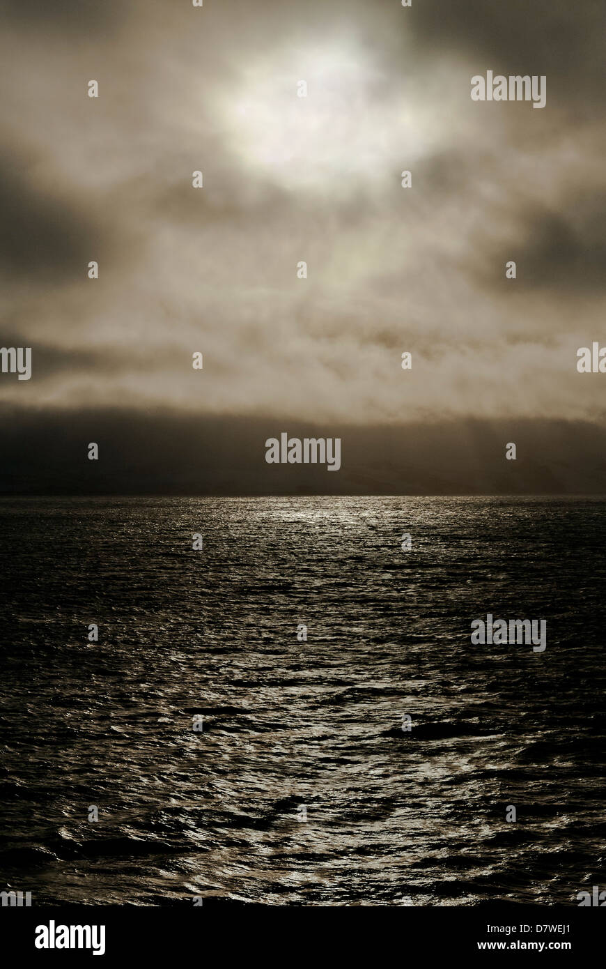 sun burst through sepia clouds Antarctica Stock Photo - Alamy