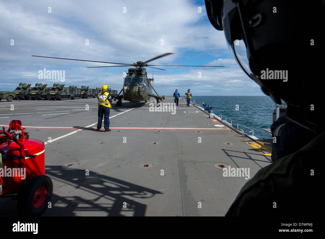 Royal Navy Mk4 Sea King helicopter on the flight deck of Assault SHip ...