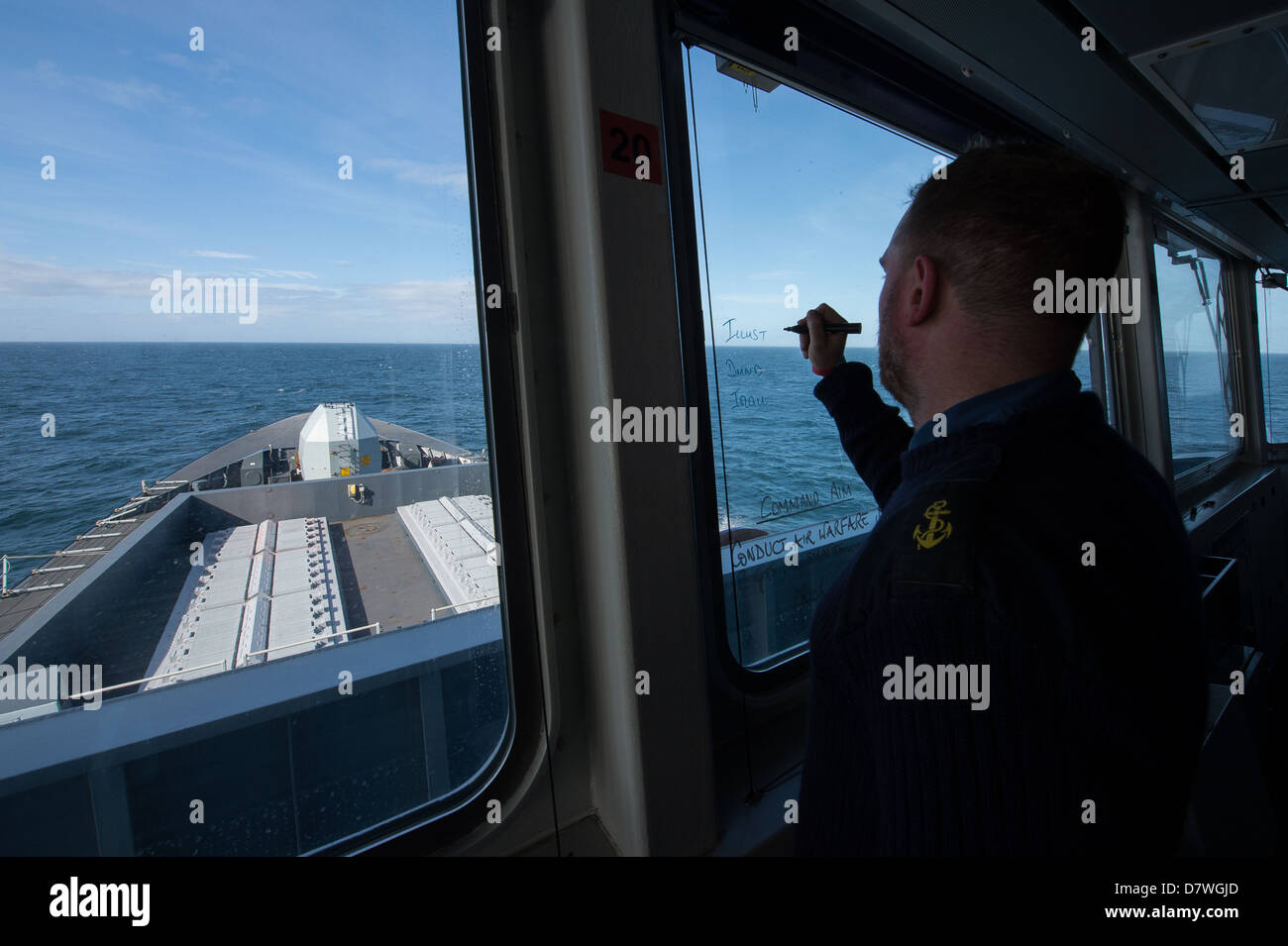 On the bridge of Royal Navy Type 45 destroyer HMS Diamond at sea with ...