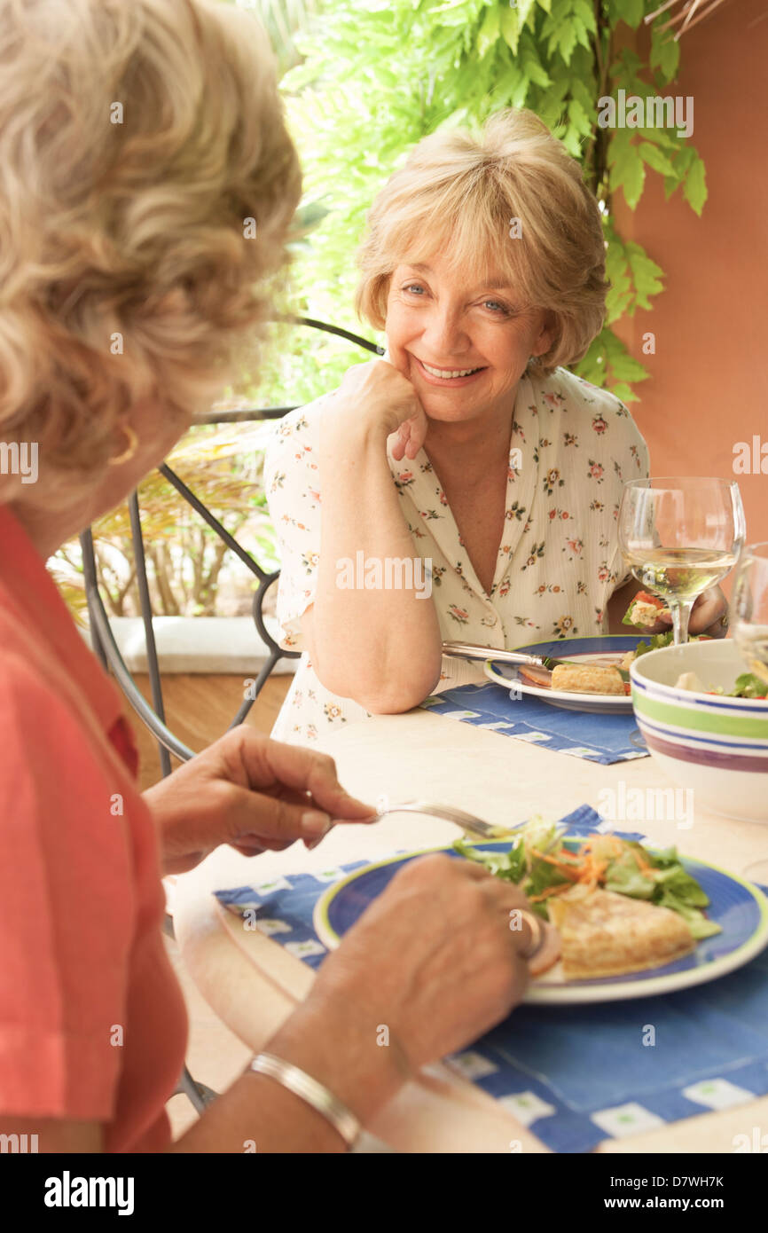 Two Women Eat Lunch Outside High Resolution Stock Photography and ...