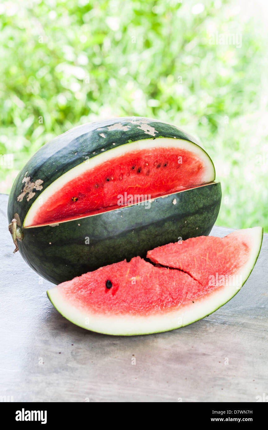 A red slice of sweet water melon Stock Photo - Alamy