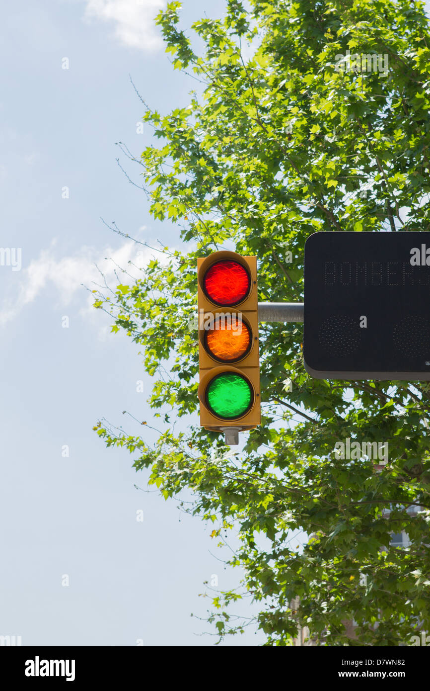 Traffic lights with all lights on. Red, green, amber Stock Photo - Alamy