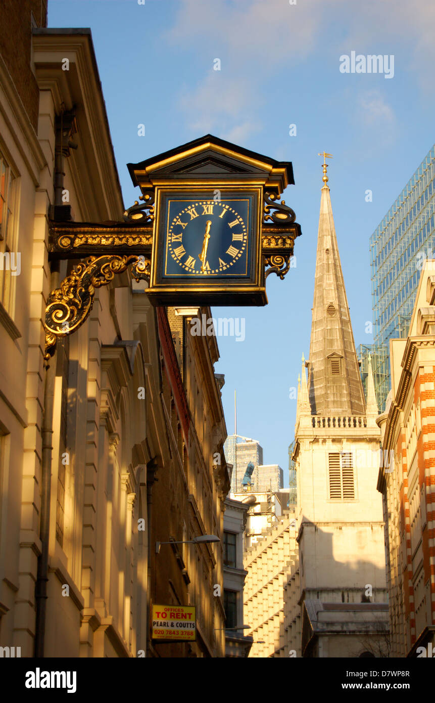Exterior wall clock in the City of London, England Stock Photo - Alamy