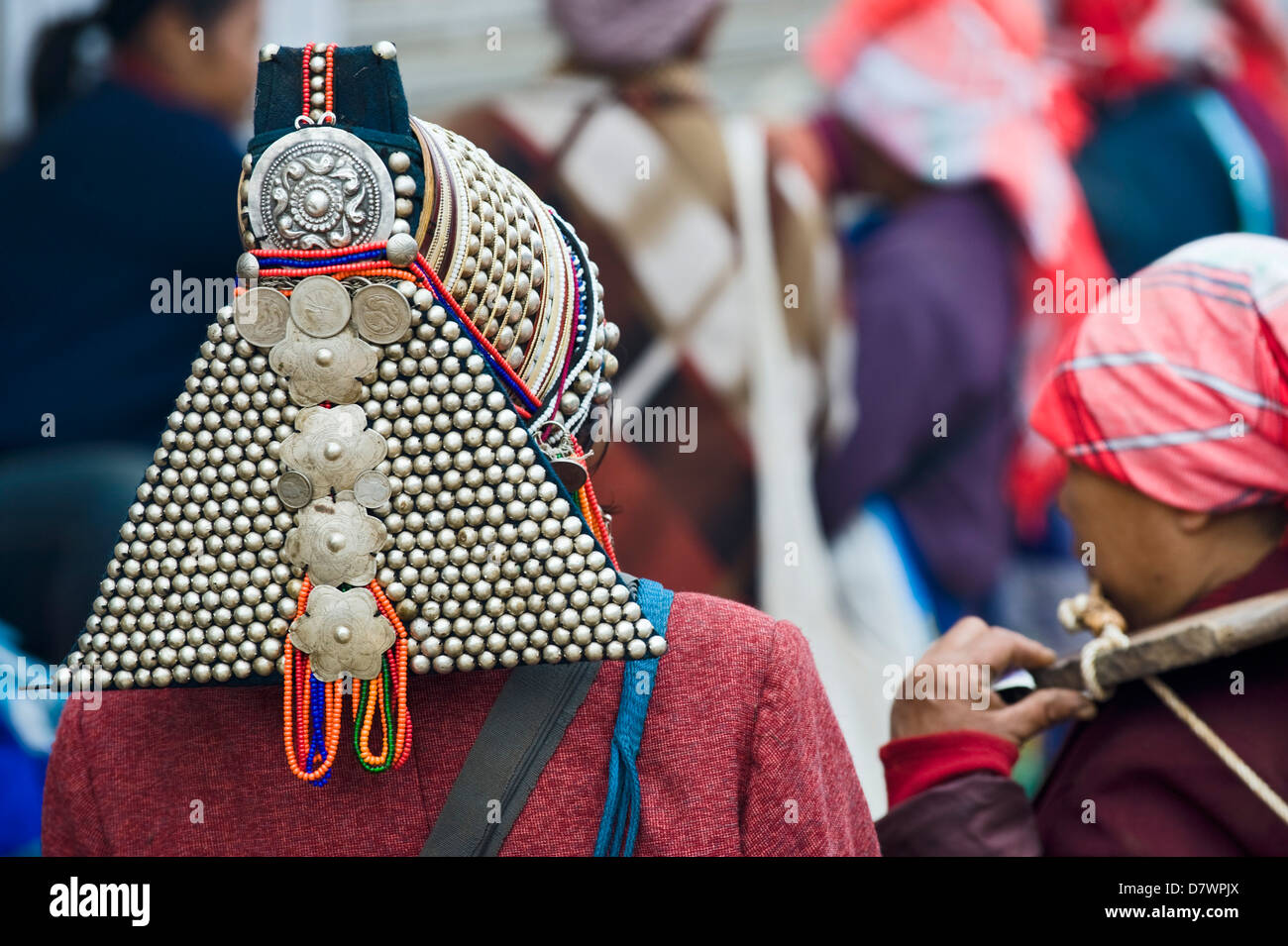Akha woman at Xiding weekly market, in the hills west of Menghai ...