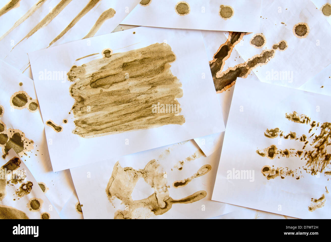 Dirty workplace - many paper sheets with sketches Stock Photo - Alamy