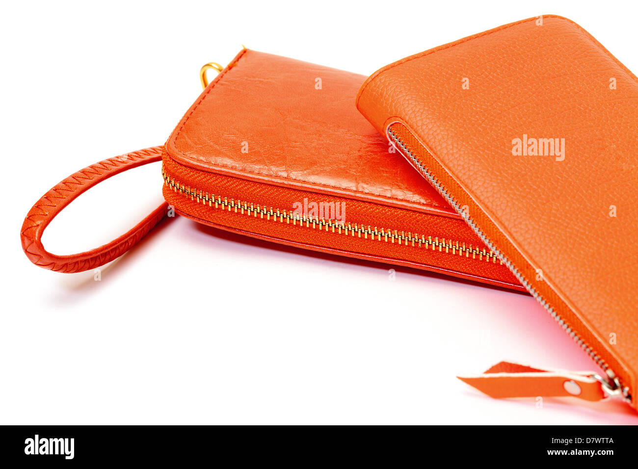 New Orange Leather Wallets on white background Stock Photo - Alamy