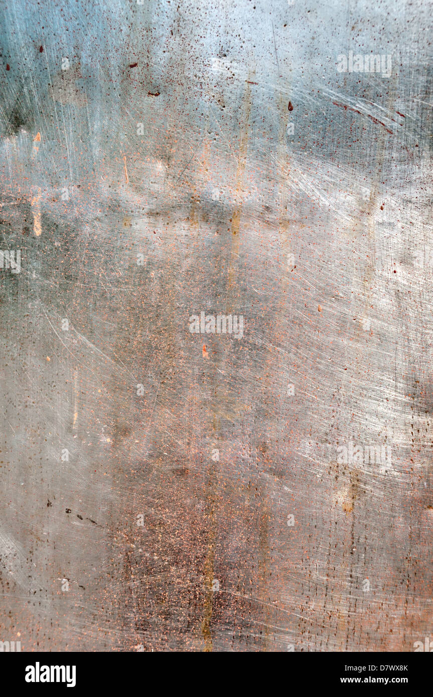 Background - an old patch from weathered stainless steel Stock Photo ...