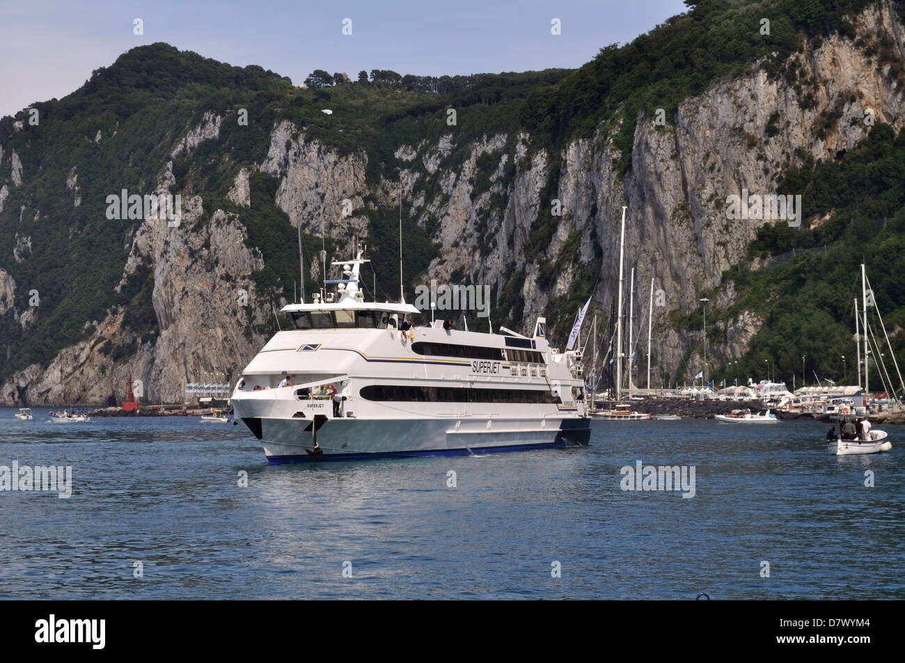 One of the many ferries that serve the island of Capri at Marina Grande ...