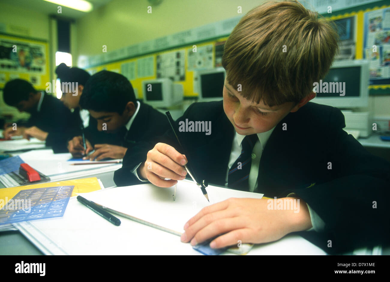 School pupil using compass in class, Heathland Secondary School ...