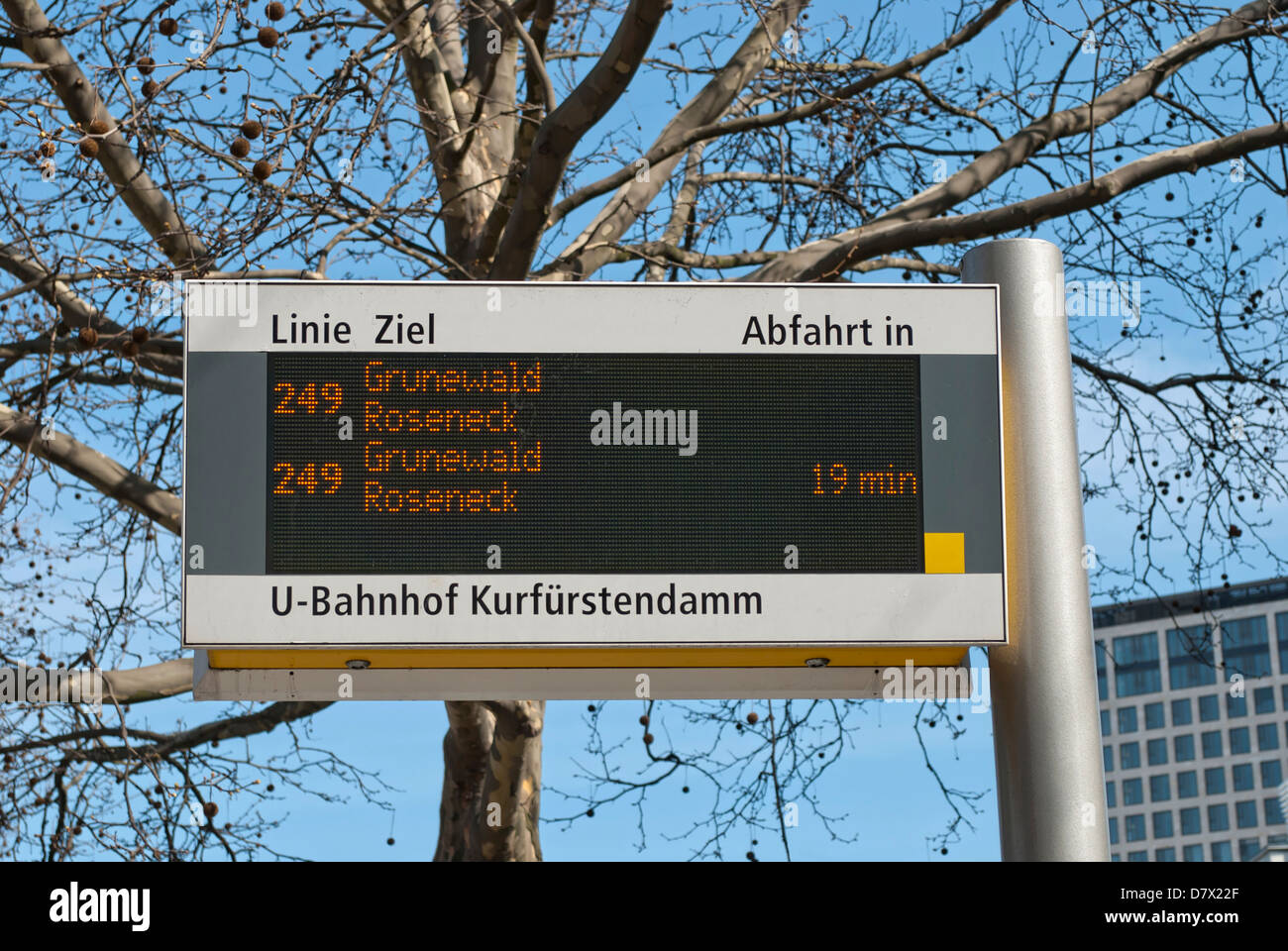 Bus stop sign on blue sky background in Berlin, Germany Stock Photo - Alamy