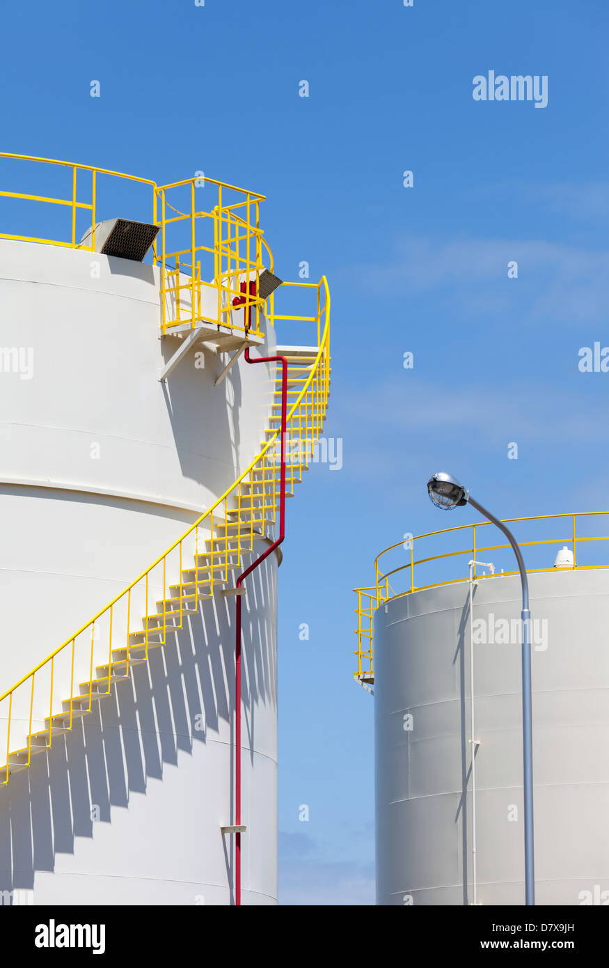 Industrial storage tank against a blue sky Stock Photo - Alamy