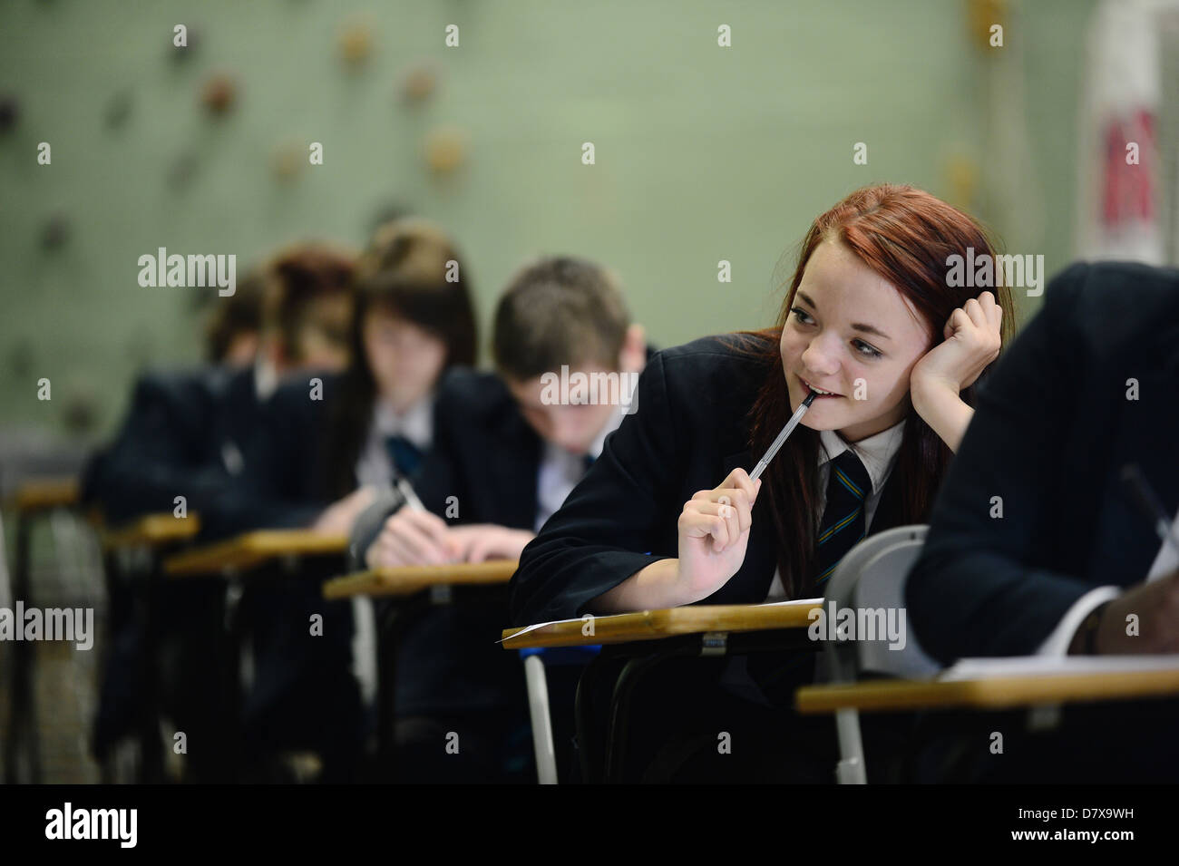 Secondary school pupils sat in a hall in exam conditions GCSE Stock ...
