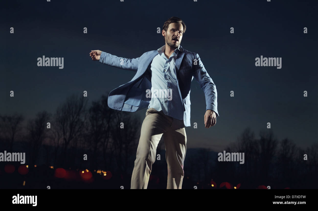 Handsome and elegant guy wearing blue jacket Stock Photo - Alamy