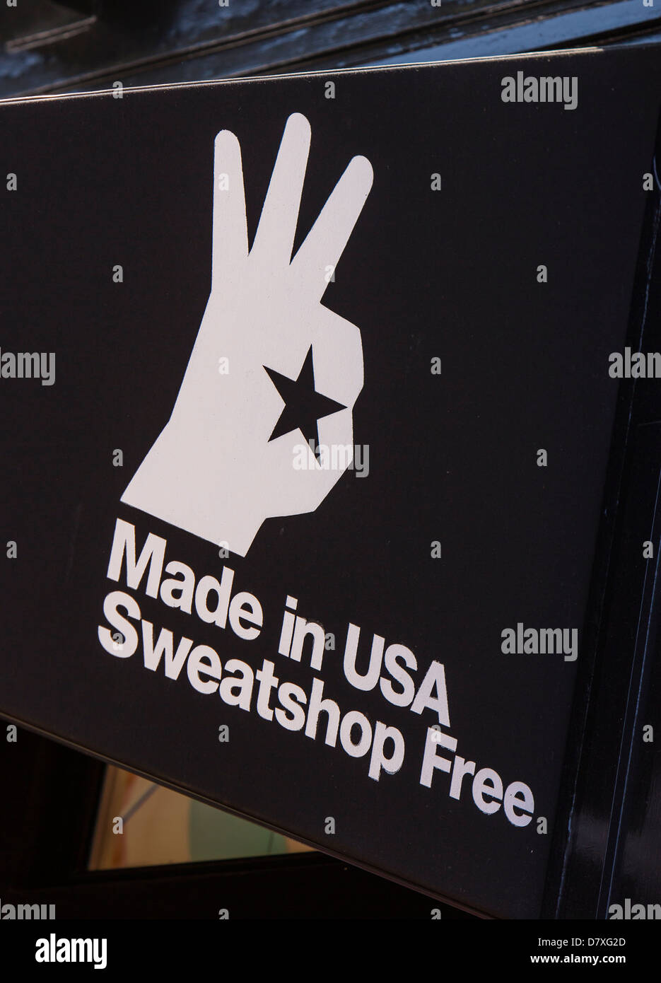 WASHINGTON, DC, USA - Made in USA Sweatshop Free sign at store on M ...
