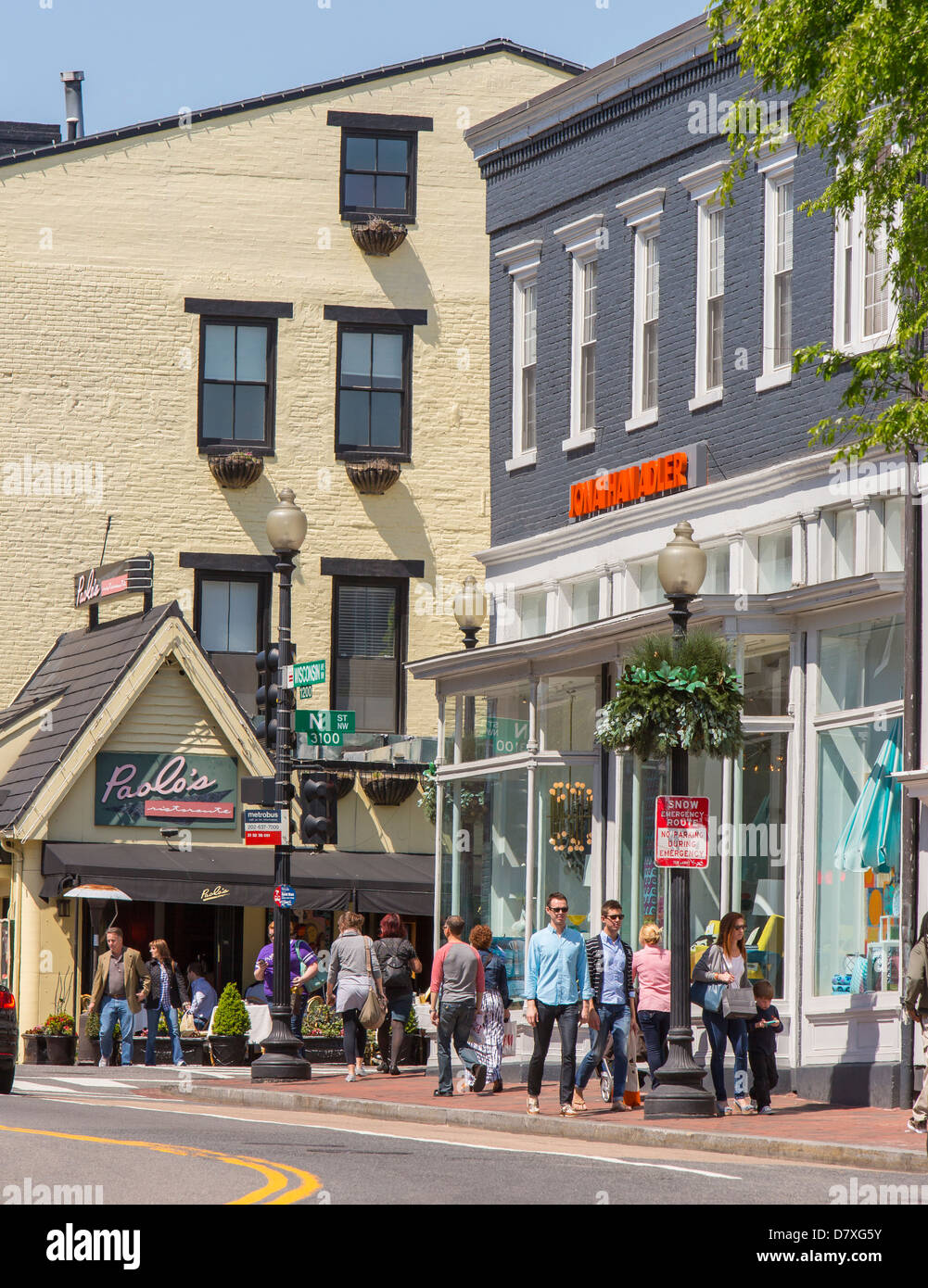 Cityscape with people walking on the street hi-res stock photography ...