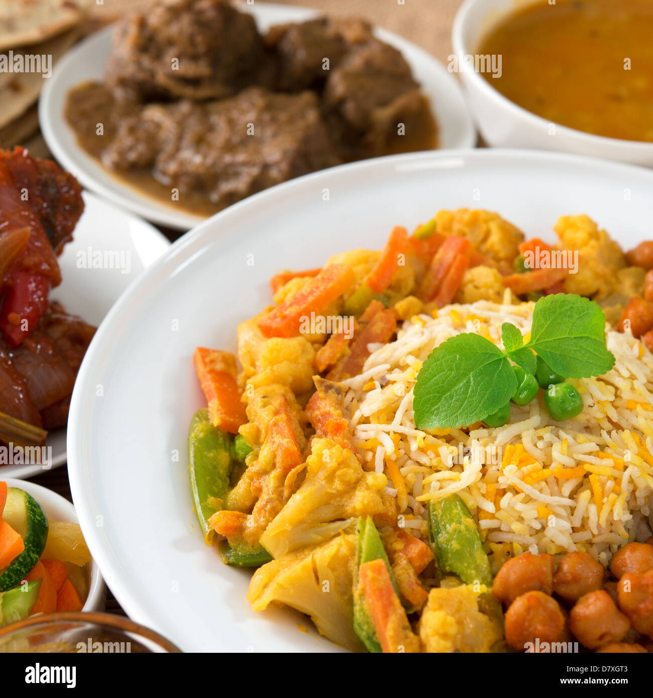 Indian cuisine biryani rice and curry Stock Photo - Alamy
