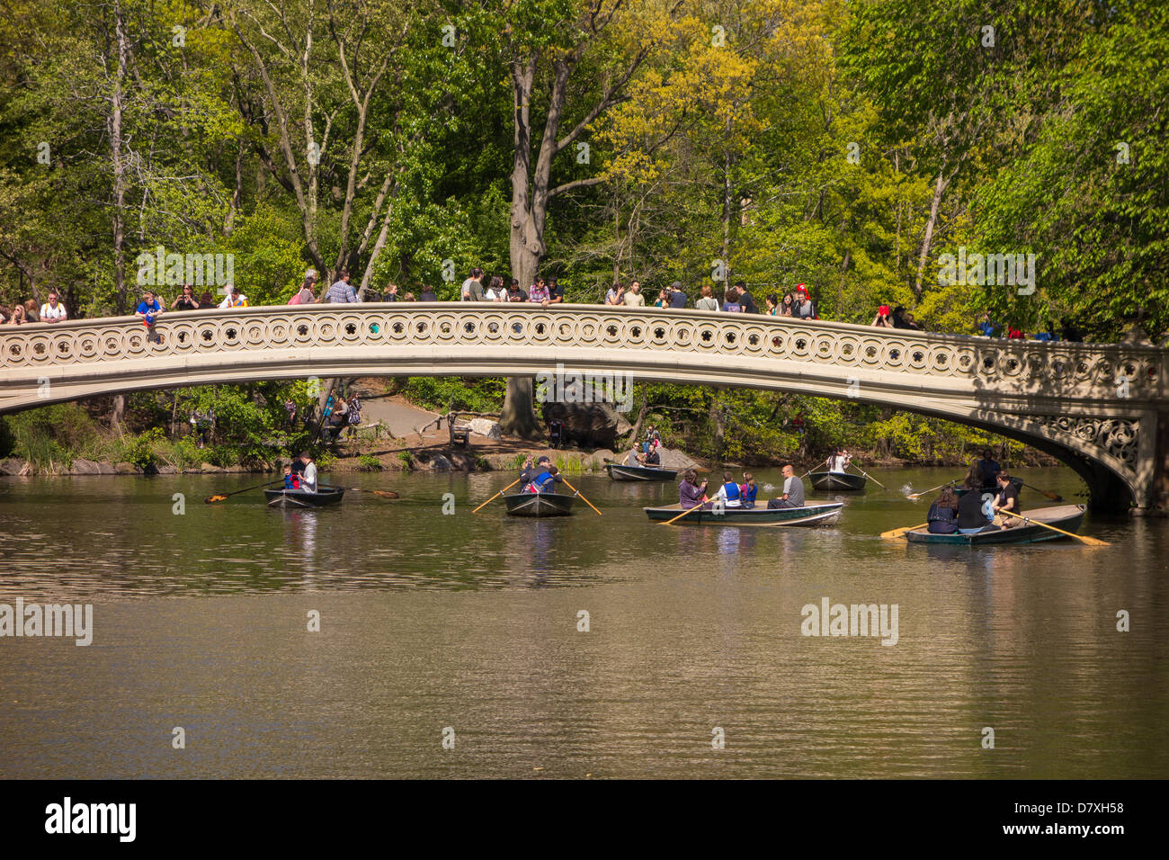 NEW YORK CITY, NY, USA - People at Bow Bridge and The Lake, in Central ...