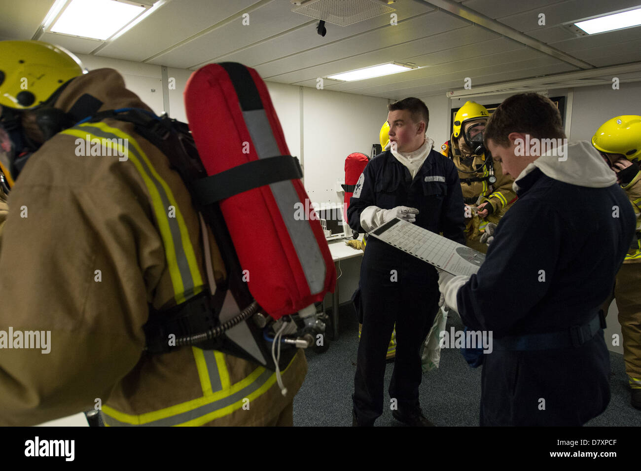 Damage control firefighting sailors hi-res stock photography and images ...