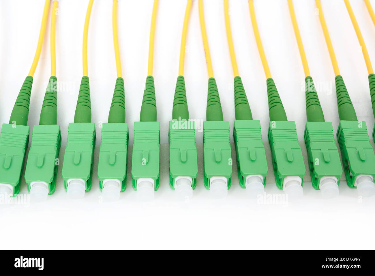 green fiber optic SC connectors on white background Stock Photo - Alamy