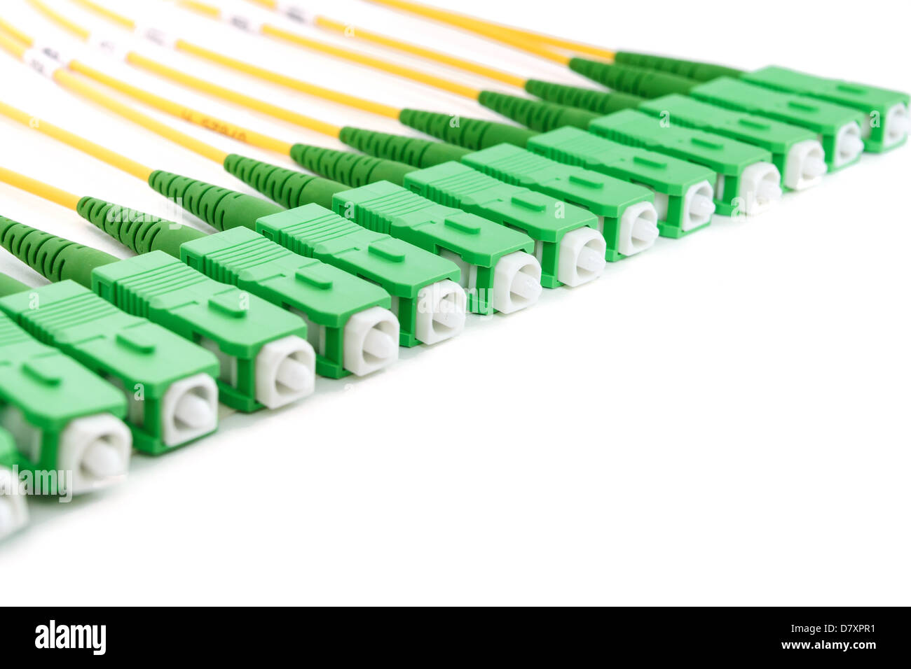 green fiber optic SC connectors on white background Stock Photo - Alamy