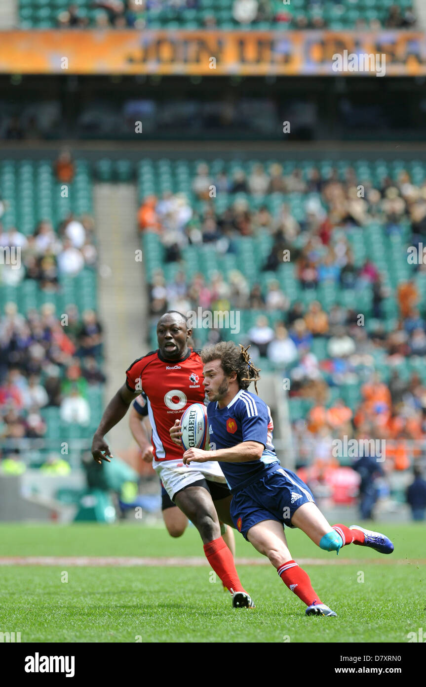 Terry Bouhraoua (Scrum-half, France) swerves to avoid being run down by ...