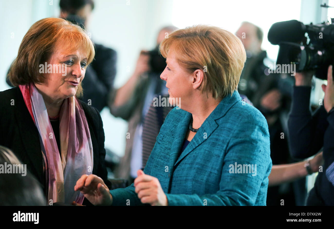 Berlin, Germany, 15 May 2013. German chancellor Angela Merkel (R) chats ...